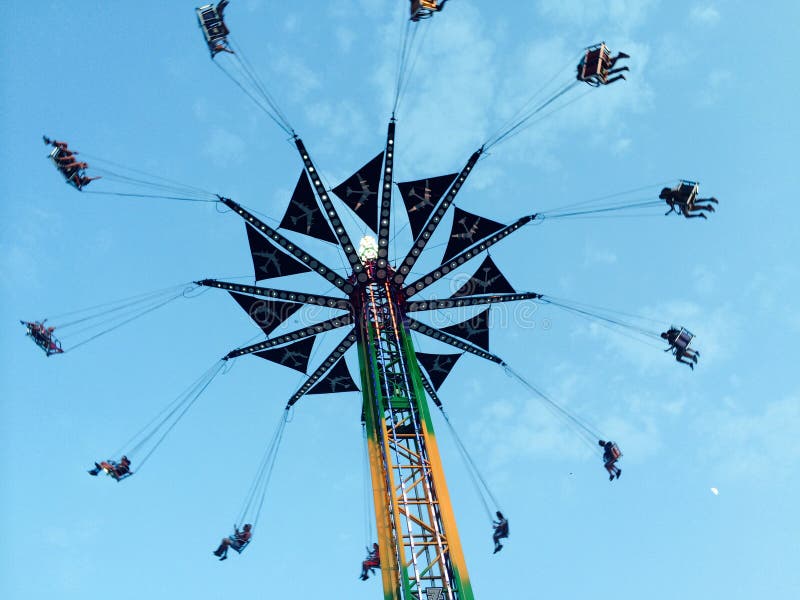 Fair rides stock image. Image of rides, blue, swings - 43290833