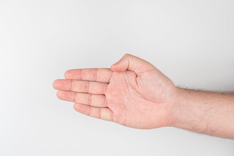 A Fair-skinned Human Hand is Shown, Palm Upwards, Hovering Above a ...