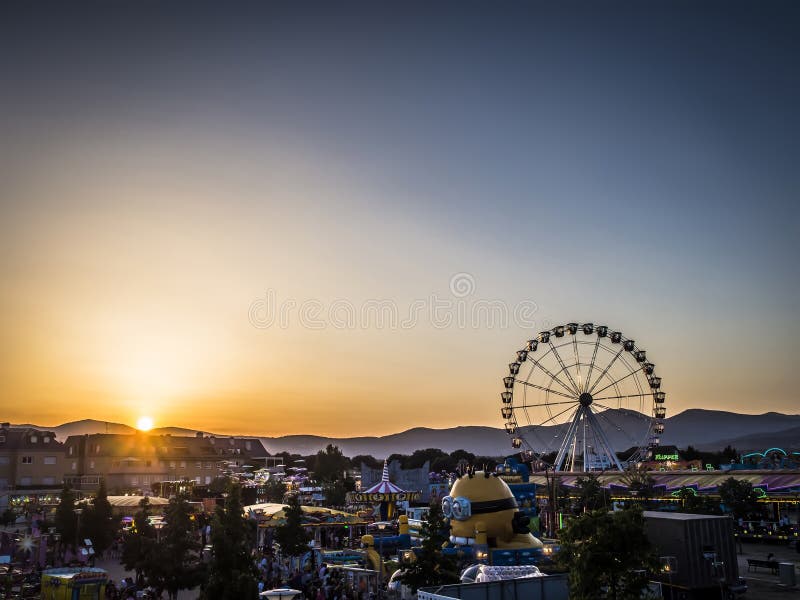 Fair at sunset stock image. Image of summer, rides, fair - 22919