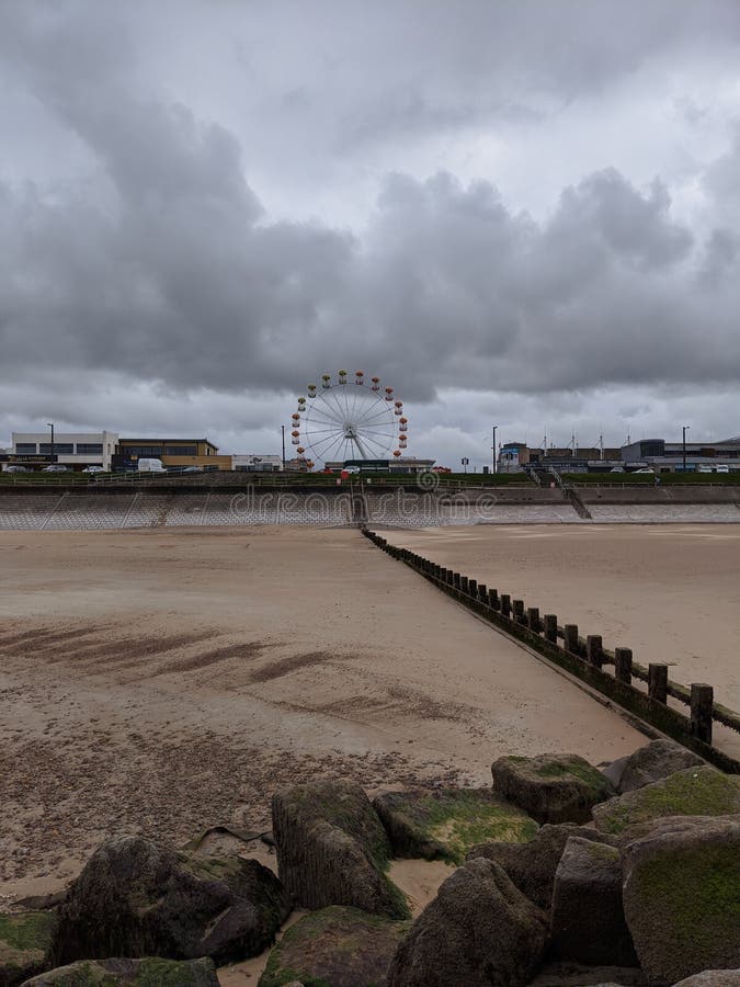 Fairground from the Beach, with the Tide Out Stock Image - Image of ...