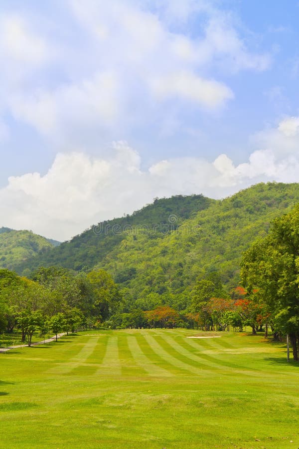 Fairway of a Golf Course beside the Mountain Stock Photo - Image of ...