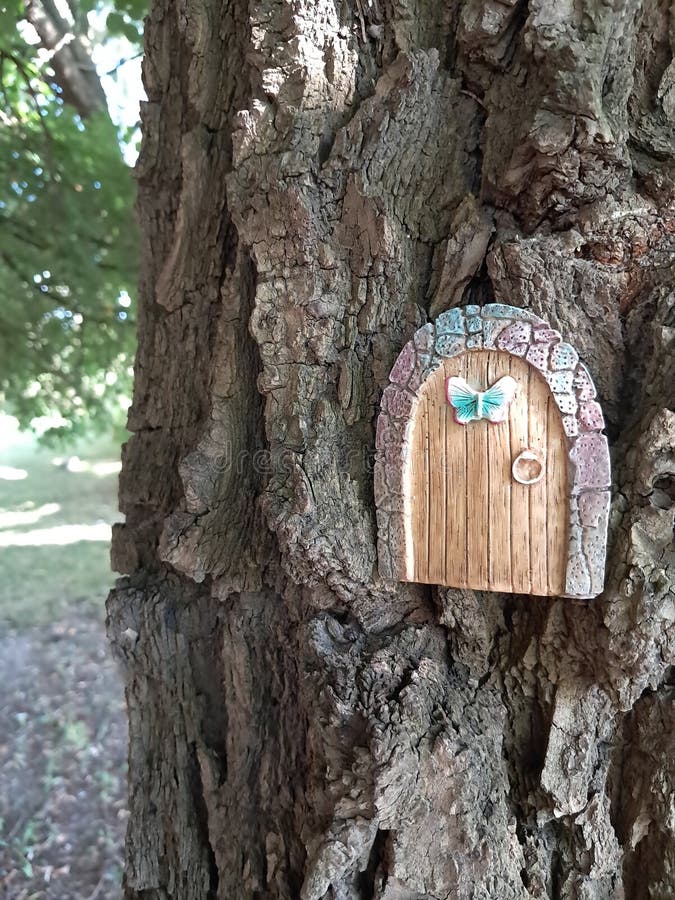 Fairy Door on the Trunk of a Tree Stock Image - Image of magical, wood ...