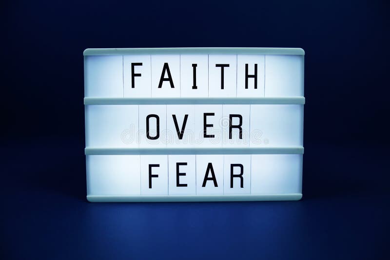 Faith Over Fear Letterboard Text on LED Lightbox on Blue Background ...