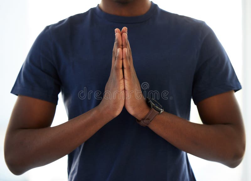 Faith Will Get You Far. Studio Shot of an Unrecognisable Man Praying ...