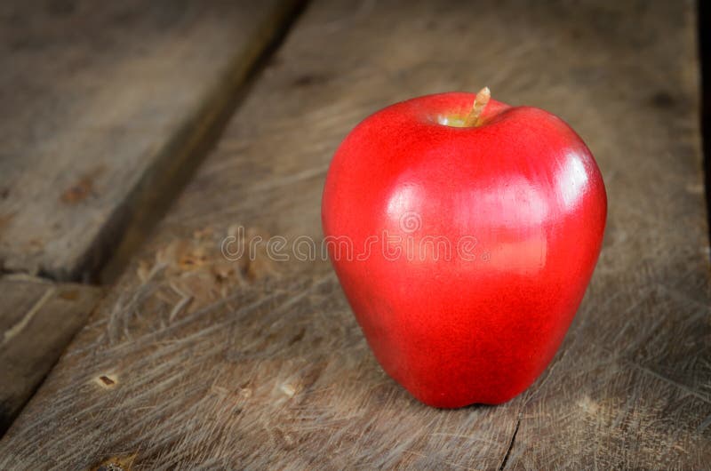 Fake Apple on Wood Background Stock Photo - Image of fresh, table: 46310074