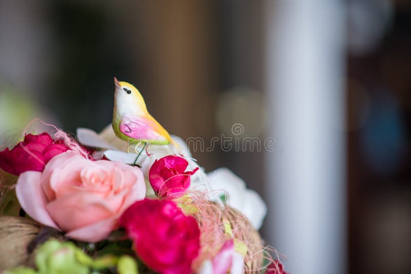 A Fake Bird and Colorful Rose Flower in Pot Stock Photo - Image of fake ...