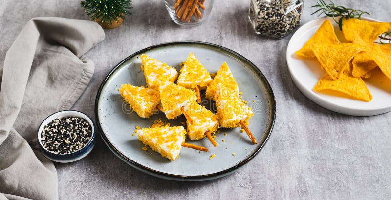 Fake Christmas Trees Made from Triangle Cheese in Nacho Crumbles on a ...