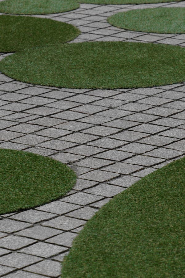 Fake Circular Grass Carpet on Paved Path Stock Photo - Image of green ...