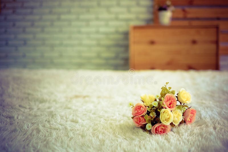 Fake flower on the bed stock image. Image of design - 230918039
