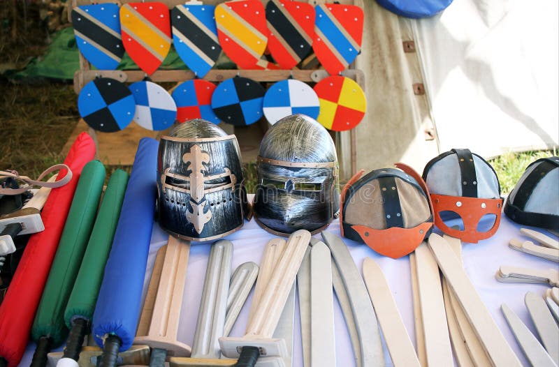 Fake Kite Shields, Helmets and Weapons Stock Photo - Image of sword ...