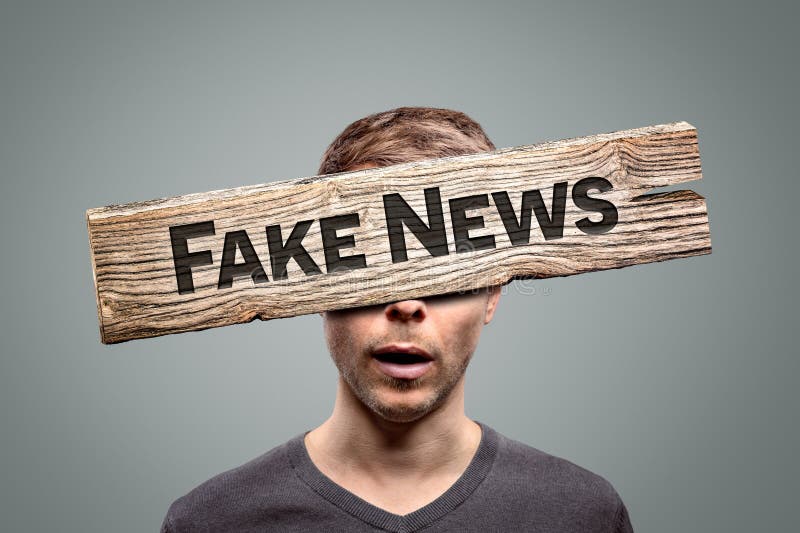 Fake News Sign in Front of a Person S Face Stock Photo - Image of news ...