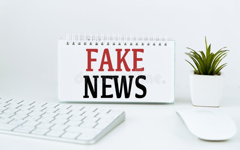 Fake News Text on Notepad, Desktop. Stock Photo - Image of artificial ...