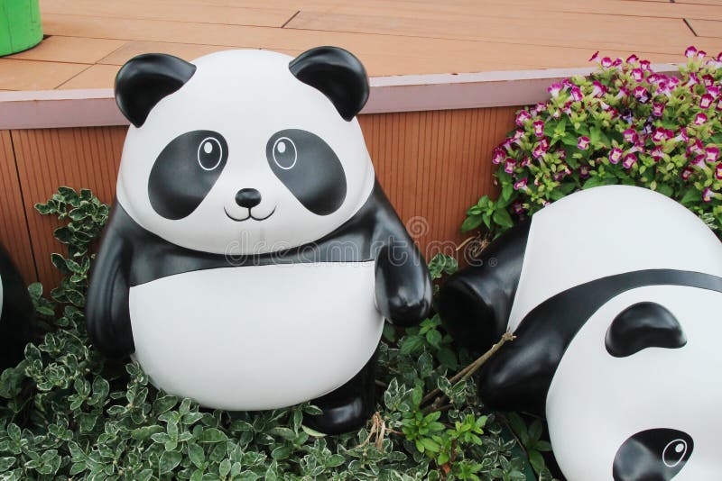 Fake panda stock image. Image of hold, panda, tree, sculpture - 33497467