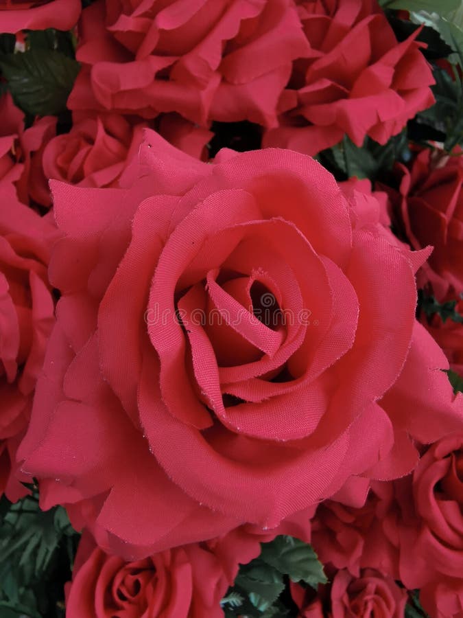 Fake red rose in bloom stock photo. Image of flora, beauty - 168602860