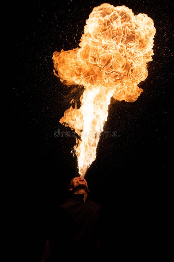 Man eating fire editorial stock photo. Image of fireeater - 83779393