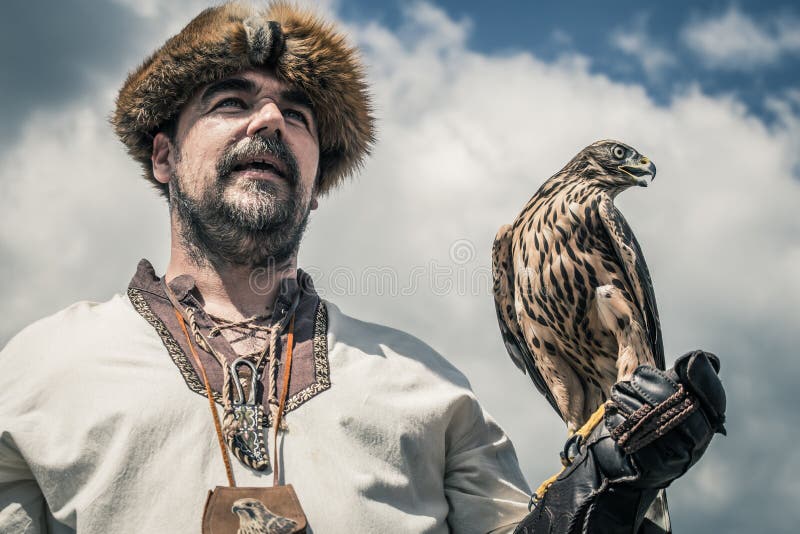 Falconer editorial image. Image of golden, aquila, falconer - 76403185