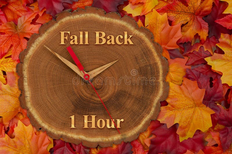 Fall Back 1 Hour Time Change with Wood Clock Stock Image - Image of ...