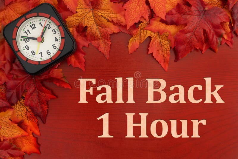 Fall Back 1 Hour with Clock and Fall Leaves for Time Change Stock Photo ...