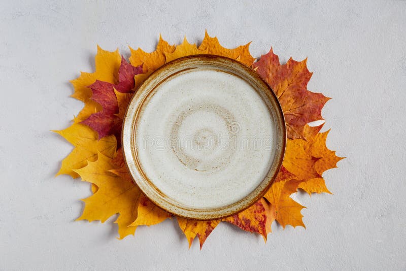 Fall Background with Empty White Plate on Yellow Autumn Maple Leaves in ...