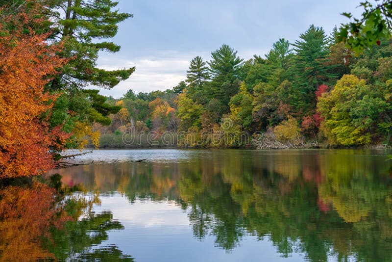 Fall Colors Reflected in Lake Stock Photo - Image of colorful, colors ...