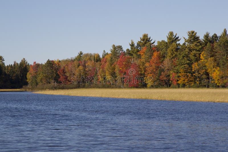 The Wisconsin River with Spring Trees and Rocky Shoreline Stock Image ...