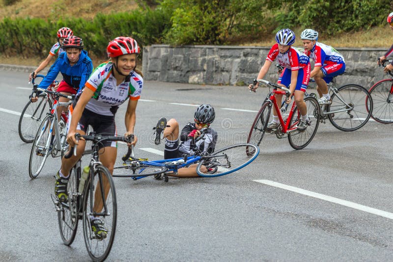 Fall of Cyclist on the Road Editorial Photo - Image of rivalry, build ...