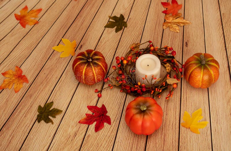 Fall Decor- Pumpkins, Leaves, and Candle on Muslin Backdrop Stock Image ...