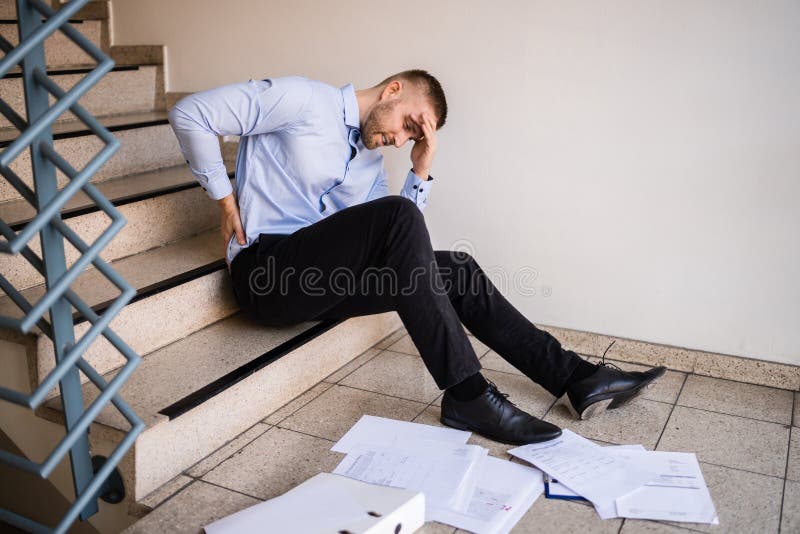 Fall and Fall Injury Accident at Workplace Stock Photo - Image of back ...