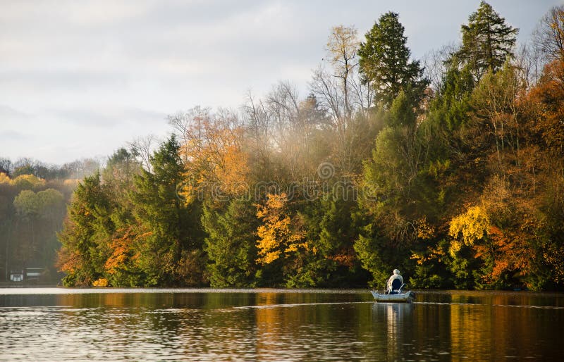 Fall Fishing on the Lake stock photo. Image of green - 27258804