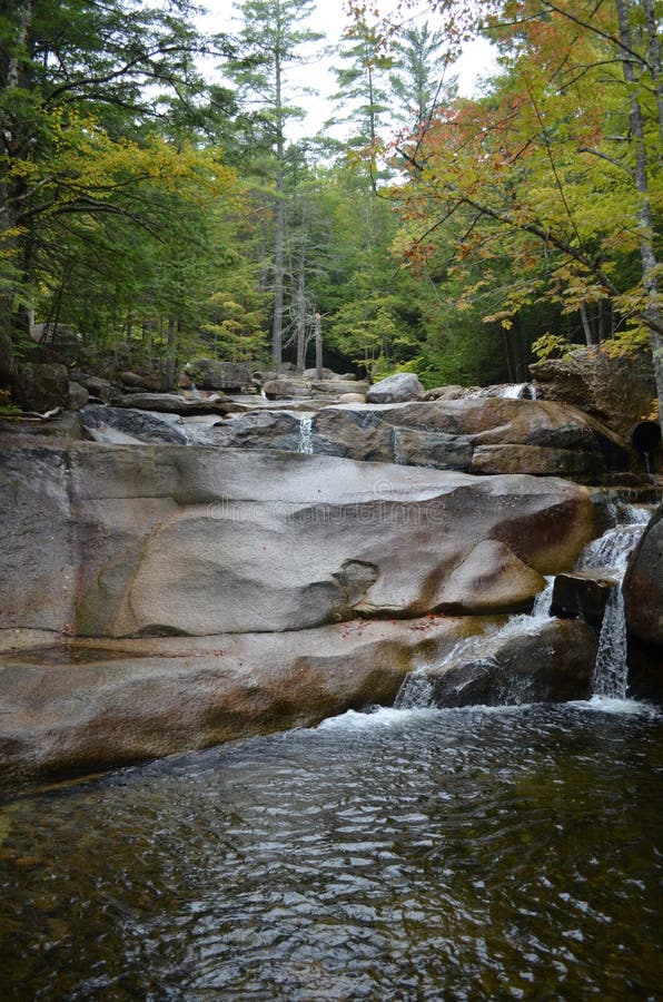 Fall Foliage with Tiered Waterfalls on Rocks Stock Photo - Image of ...