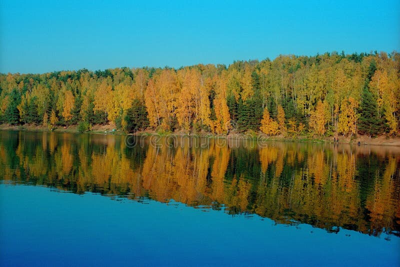 Autumn Trees Reflected in Blue Lake in Fall Stock Image - Image of ...