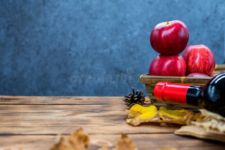 Fall Harvest Cornucopia. Basket with Red Apple and Wine on the Table ...