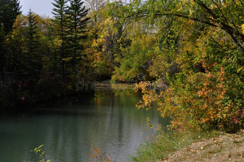 Fall Colors by the River stock photo. Image of rivers - 106700360