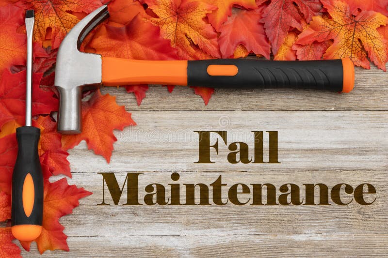 Fall Maintenance Message with a Hammer and Screwdriver on Rustic Wood ...