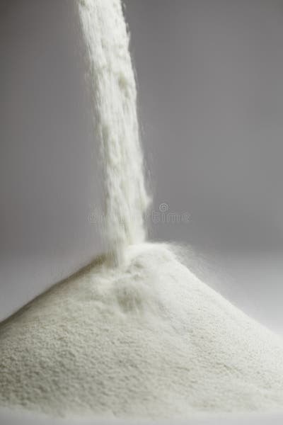 Fall of milk powder stock image. Image of collection - 27286743