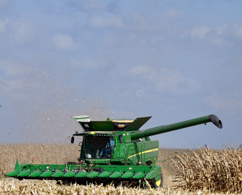 Harvester Combine and Grain Cart on Back of Tractor Editorial Photo ...