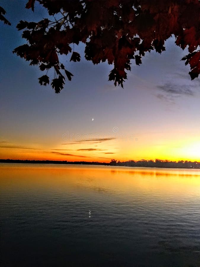 Fall Sunset on the Lakes Horizon with the Crescent Moon Stock Image ...