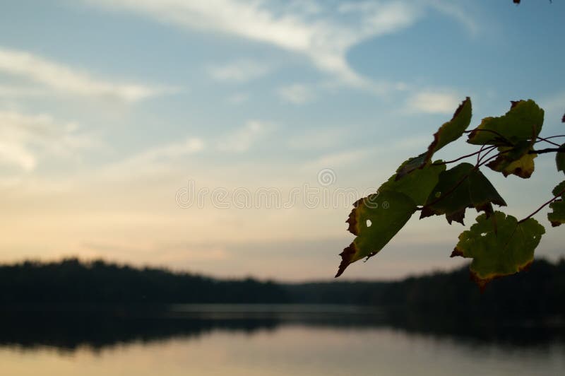 A Fall Sunset Turns a Lake into a Mirror Stock Image - Image of light ...