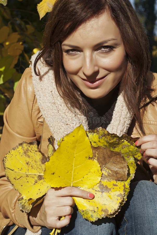 Woman with Fall Vibrant Leaves Stock Image - Image of mixed, fall: 27265593