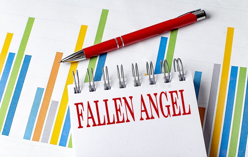 FALLEN ANGEL Text on Notebook on Chart with Pen Stock Image - Image of ...