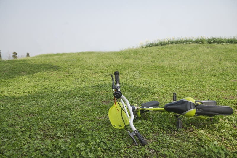 Fallen bicycle stock photo. Image of sports, field, lawn - 68746268