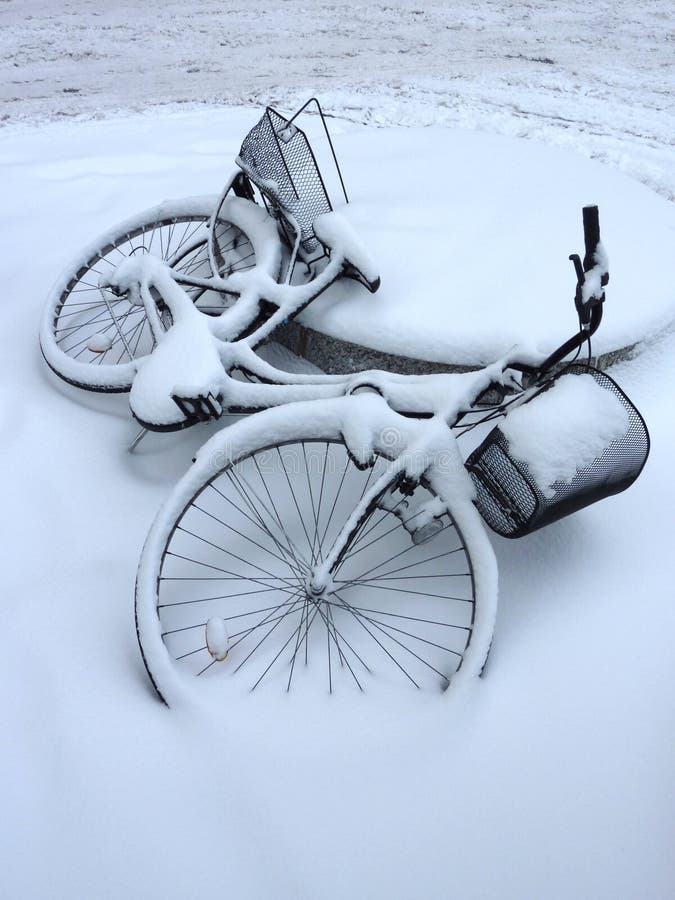 Fallen Bicycle Covered by Snow Stock Photo - Image of road, pedal: 12548464