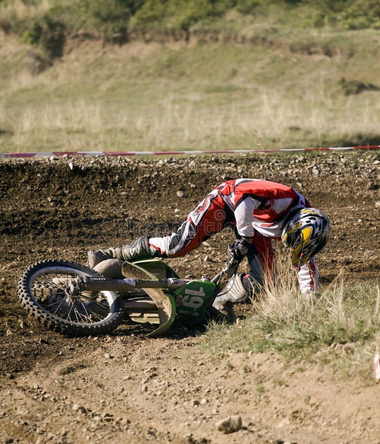 Fallen motocross racer. editorial stock photo. Image of motorcycle ...