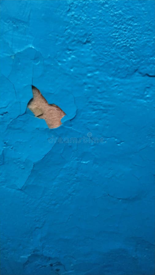 Fallen Off Piece of Plaster on a Wall Painted Blue. Background, Texture ...