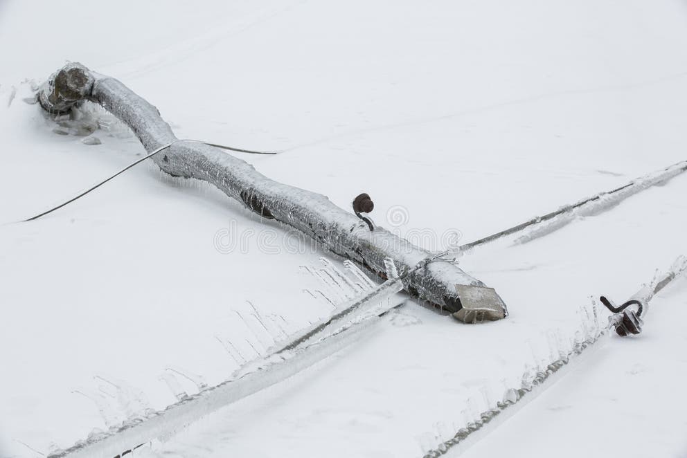 Fallen Pylon Covered with Ice Stock Image - Image of nature, dangerous ...