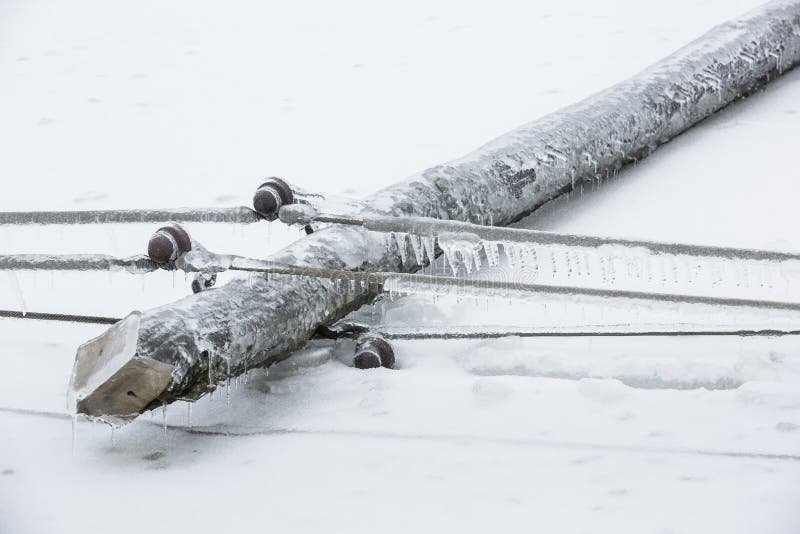 Fallen Pylon Covered with Ice Stock Image - Image of nature, dangerous ...