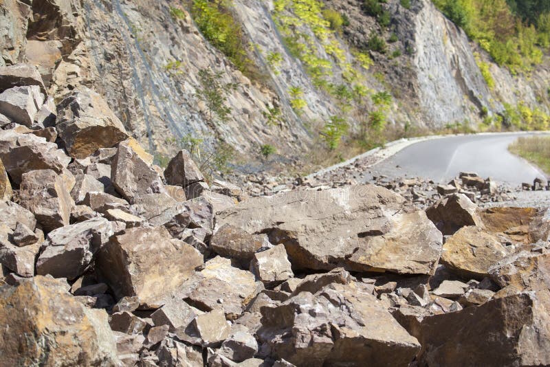 Fallen Stones on the Road stock photo. Image of fallen - 60191968