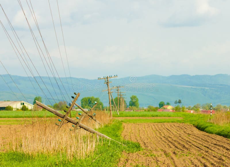 Fallen Telephone Poles on the Field Stock Photo - Image of phone, wood ...