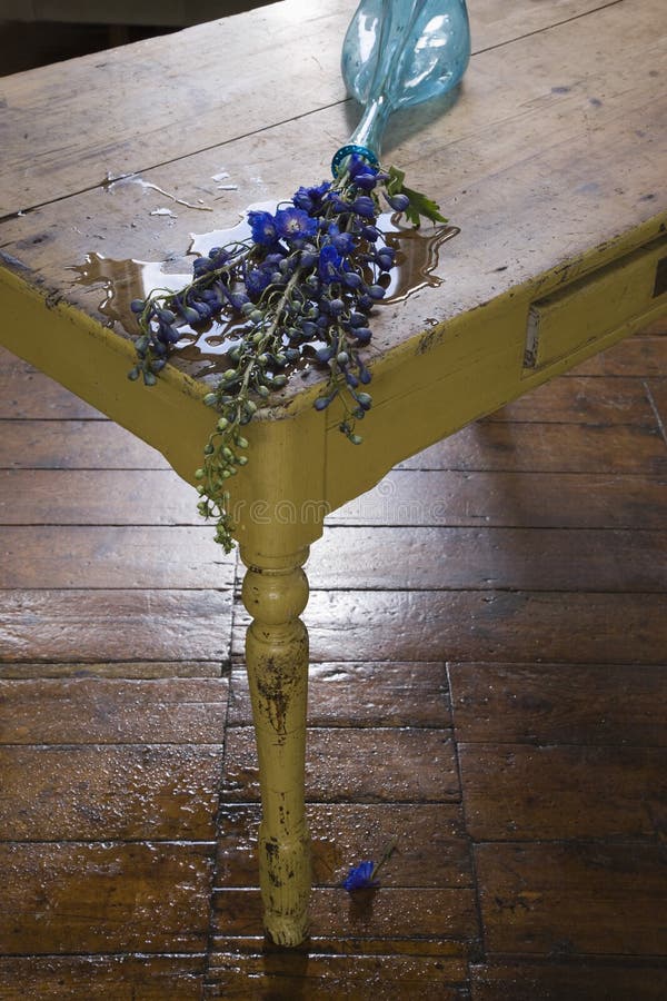 Fallen Vase on Table stock image. Image of wood, elevated - 33899801