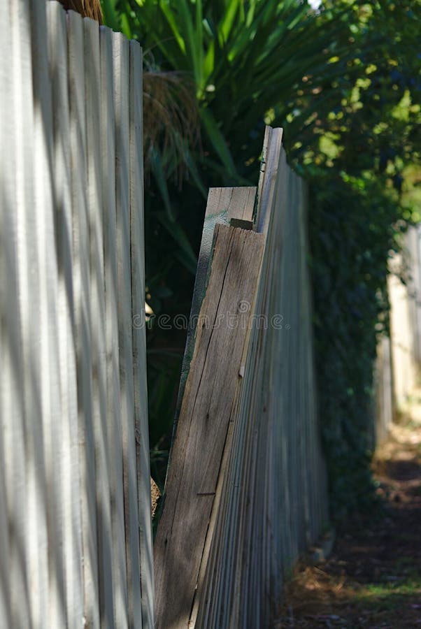 Almost fallen wooden fence stock photo. Image of untidy - 132244992